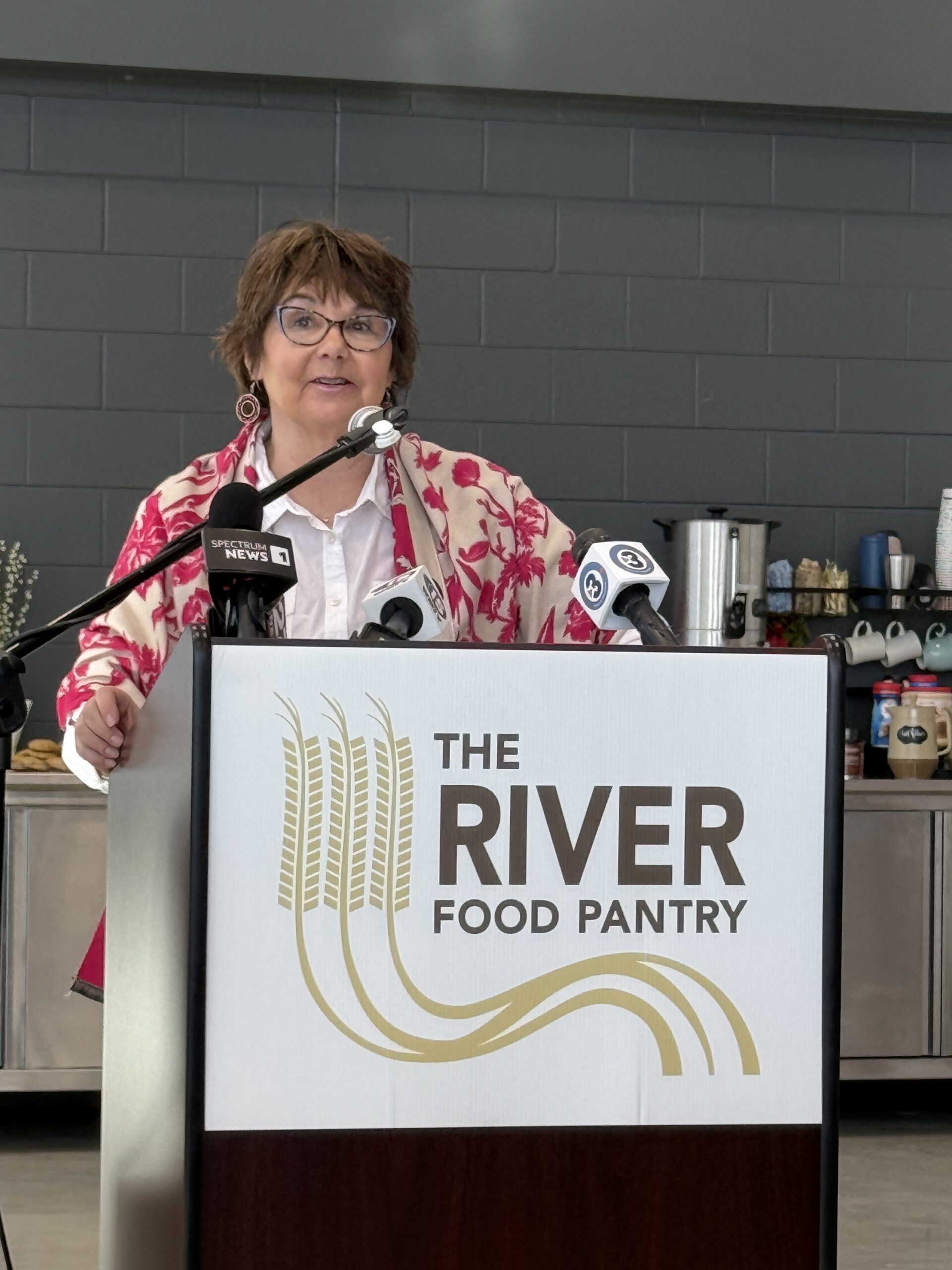 Rhonda at the podium | The River Food Pantry